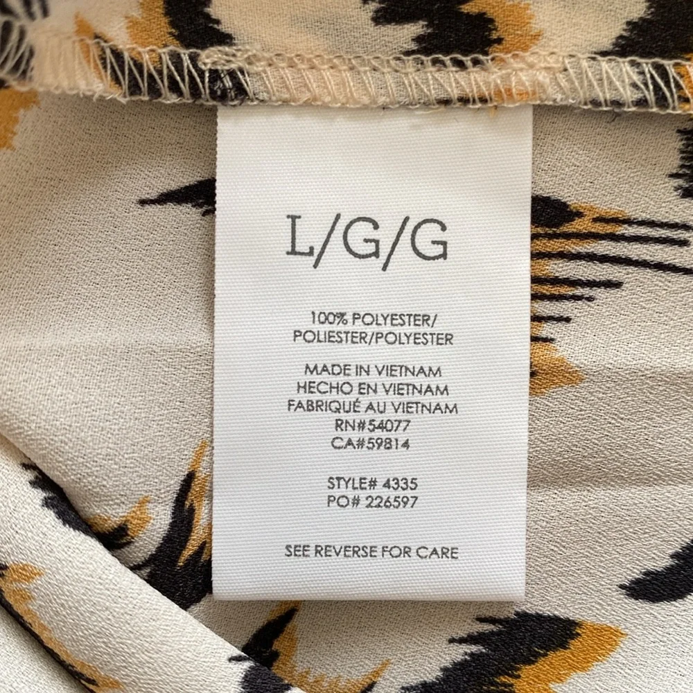 CAbi | Tops | Cabi Round Trip Safari Leopard Print Cream Black Long ...